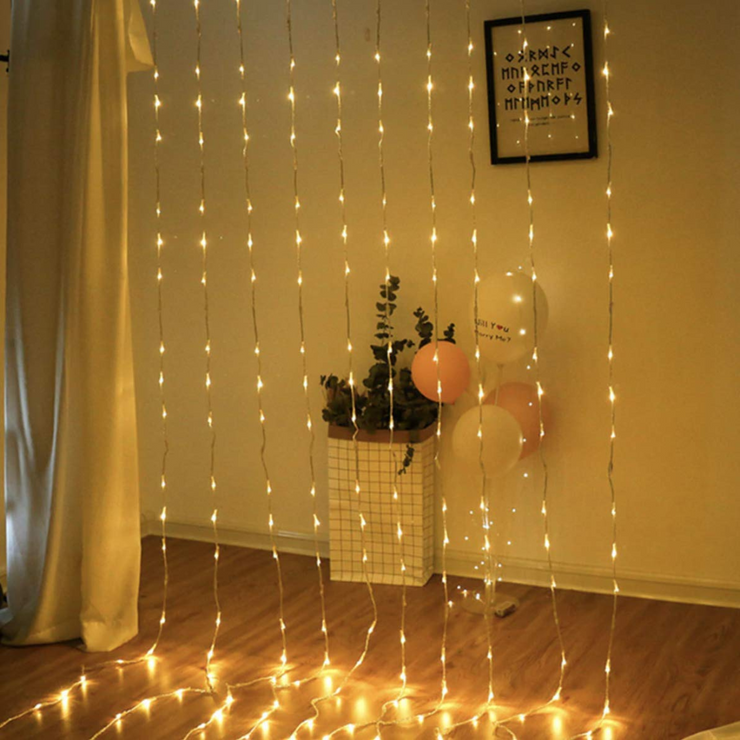 Shop our Fairy Lights Waterfall Curtain Lights Warm White – Chronos Lights