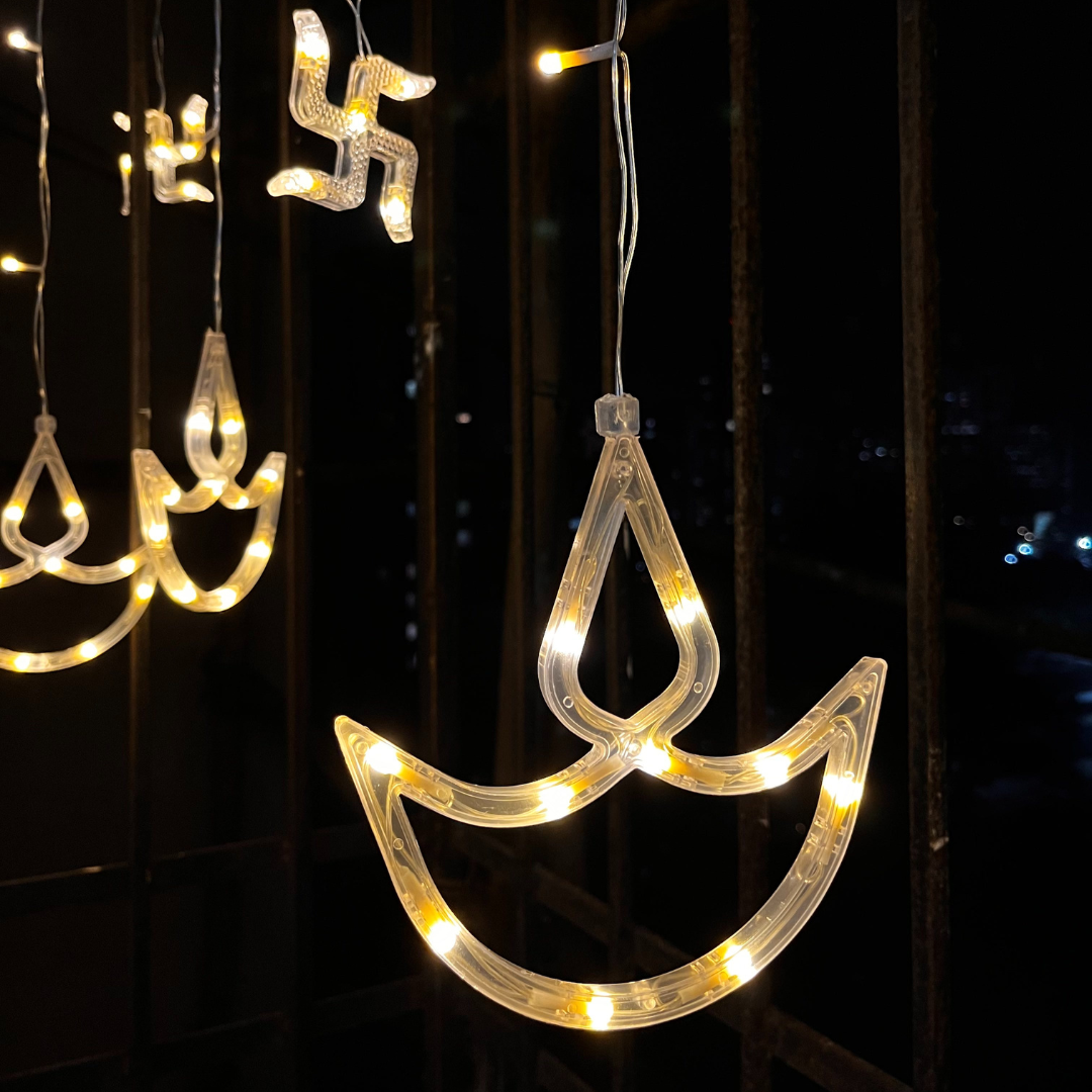 Illuminate Your Space with Swastik Diya Curtain Lights – Chronos Lights